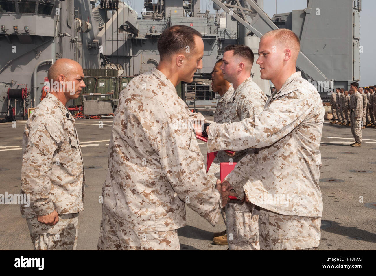 ARABIAN GULF (July 1, 2015) U.S. Marine Capt. Neil MacLaren, left ...