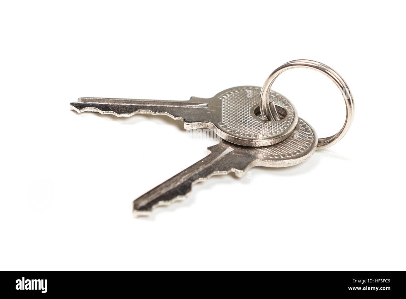 Two silver keys isolated on white background Stock Photo - Alamy