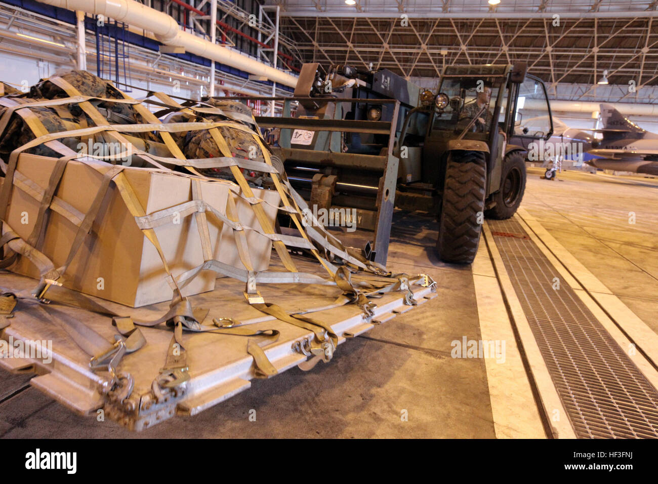 Lance Cpl. Gregory S. Pugh, a heavy equipment operator attached to the ...