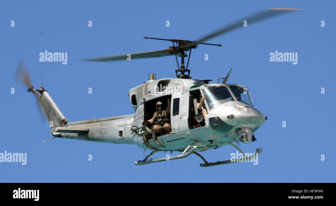 Cpl. Justin G. Noel, a UH-1N Huey helicopter crew chief with Marine ...