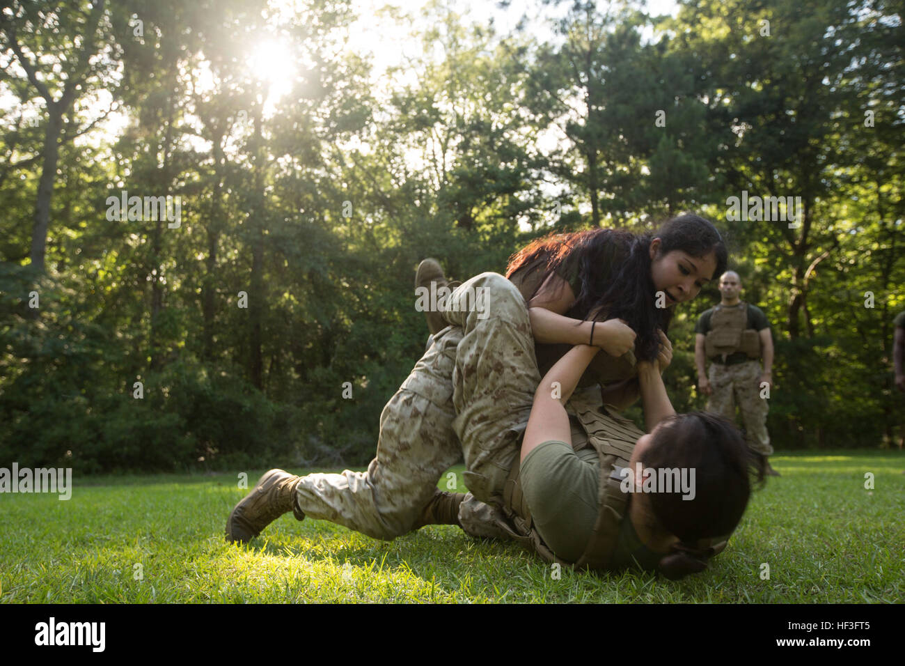 U.S. Marine Corps Pfc. Joselyn Martinez-Marin, top, a reproduction ...