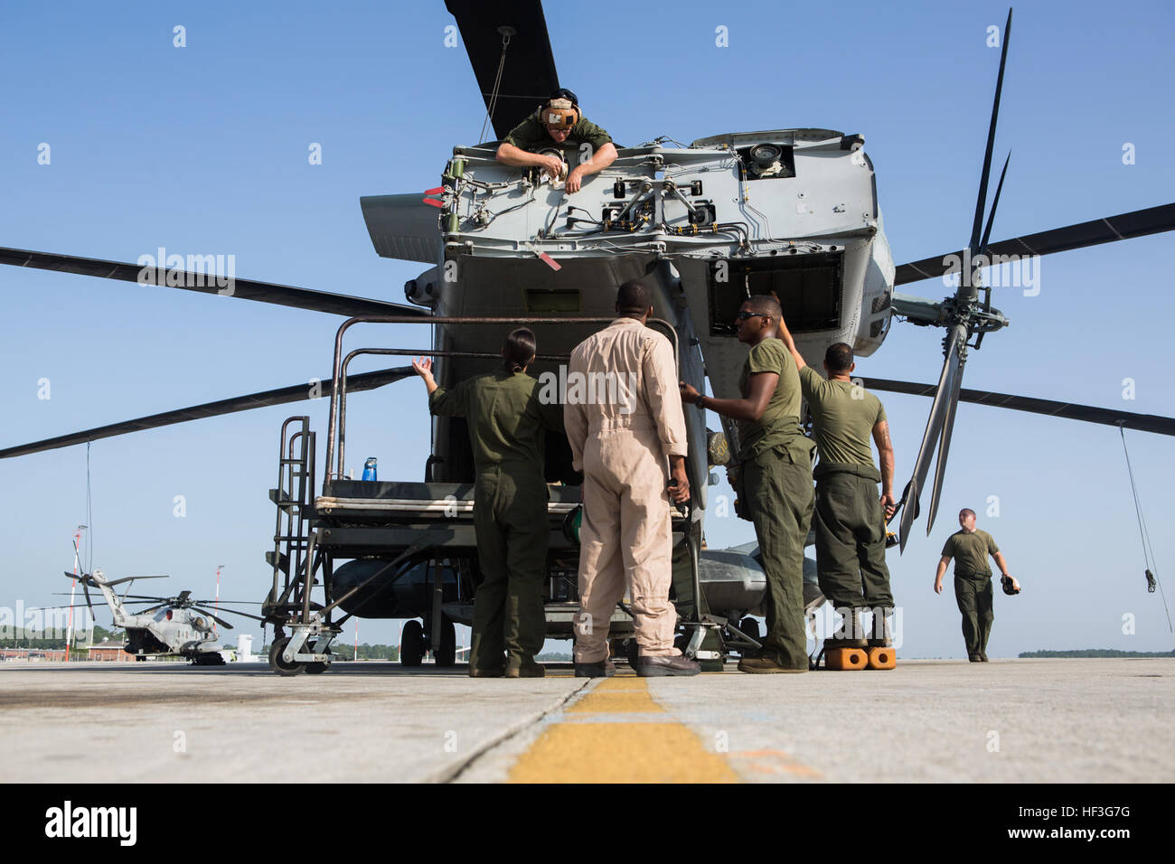 U.S. Marines assigned to Marine Heavy Helicopter Squadron 366 perform a ...