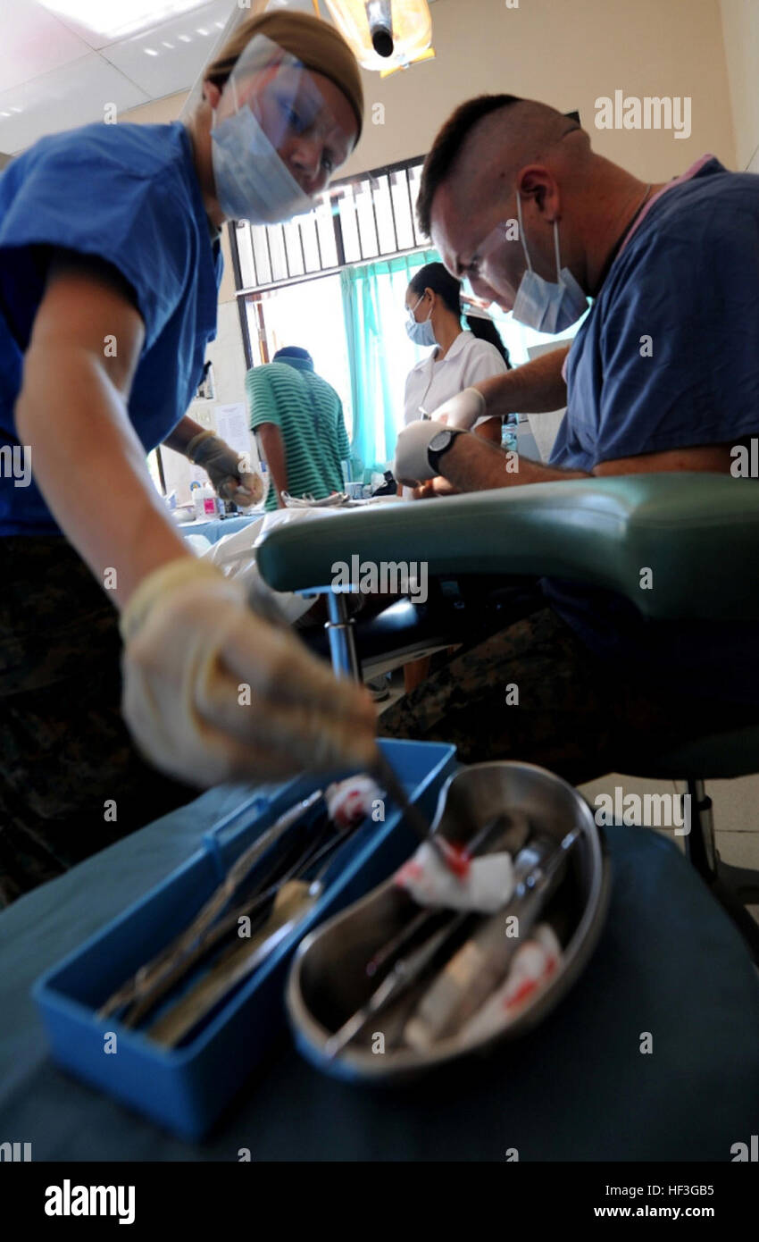 Lt. Billy Turley and Hospital Corpsmen 2nd Class Rachel Arndt, assigned ...