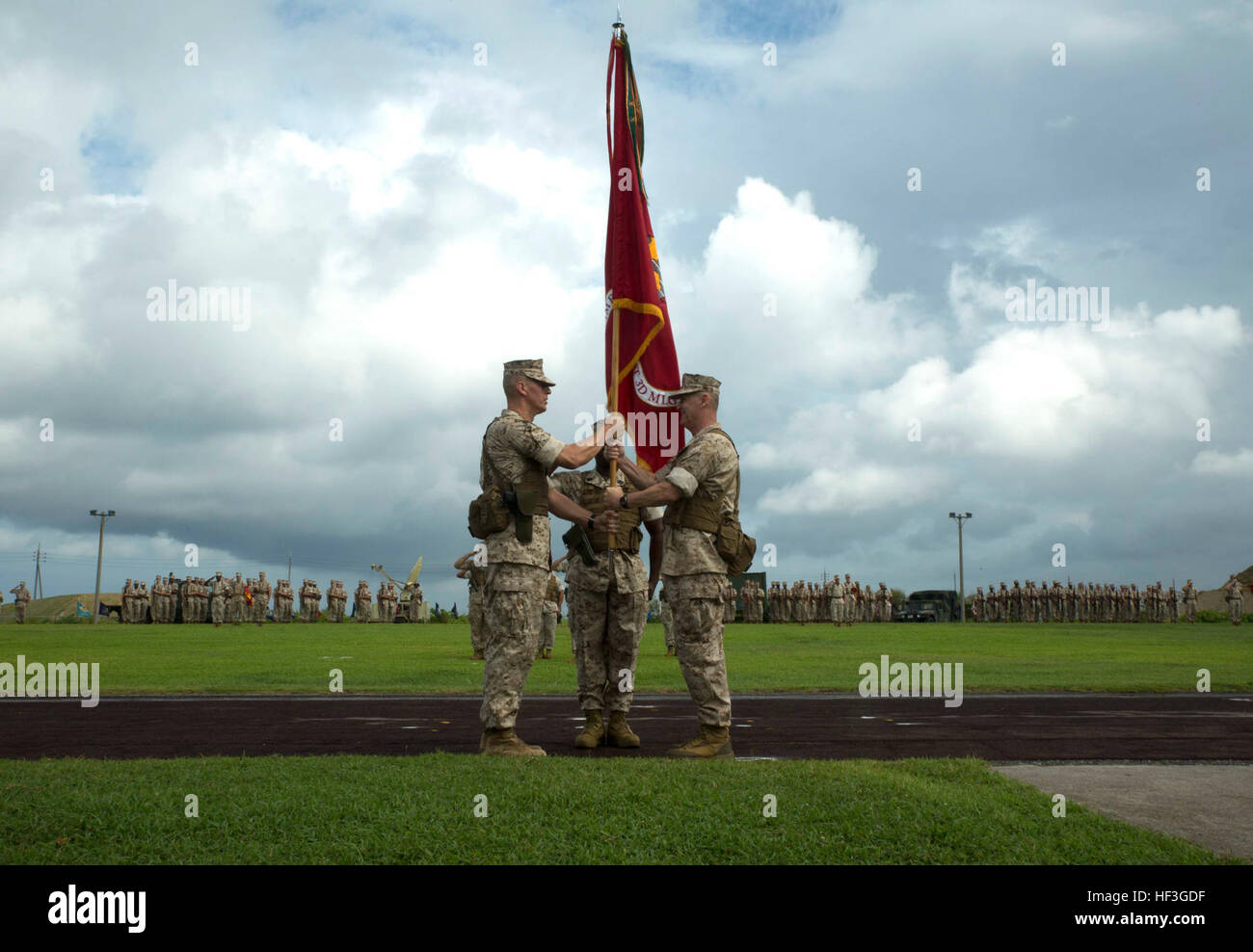 Col. Christopher A. Feyedelem, left, receives the colors from Col ...