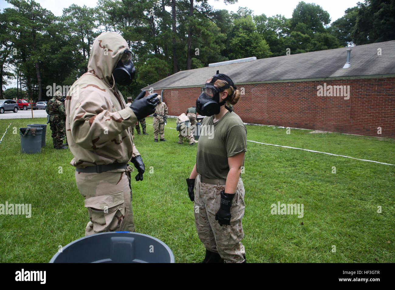 Marines with 2nd Marine Logistics Group simulate decontamination line ...