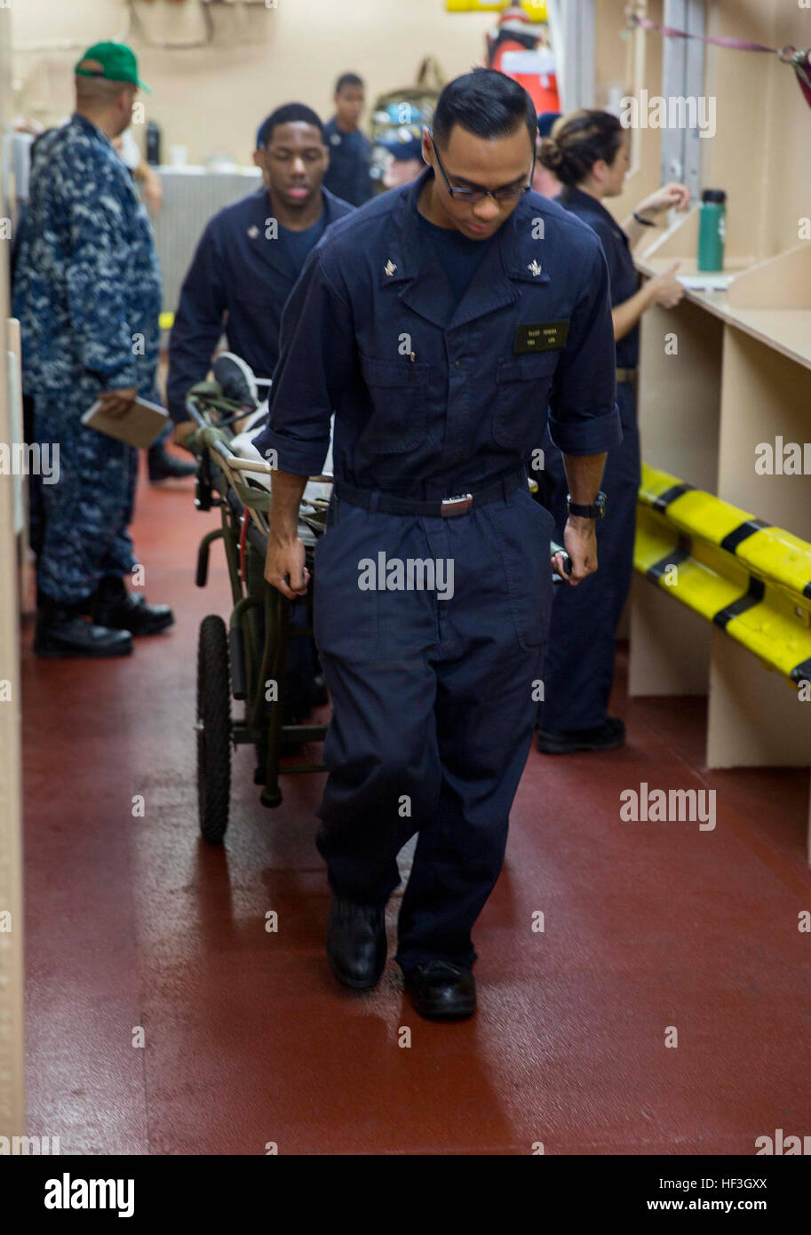 PHILIPPINE SEA (July 16, 2015) Crew members on board the hospital ship ...