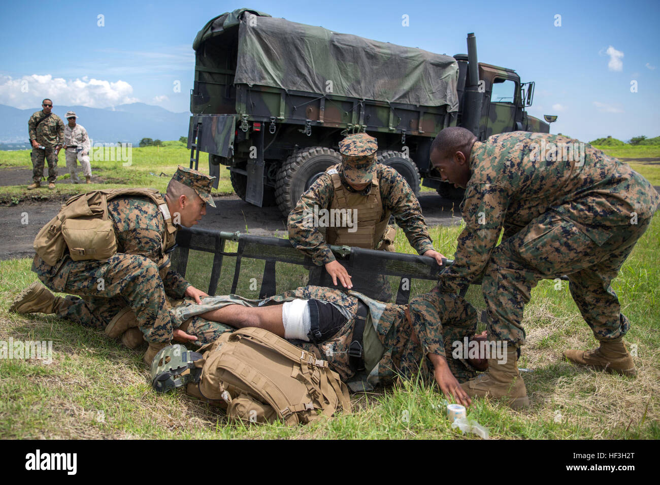 Hospital Corpsman 3rd Class Daniel Valerio, left, Hospital Corpsman Mc ...