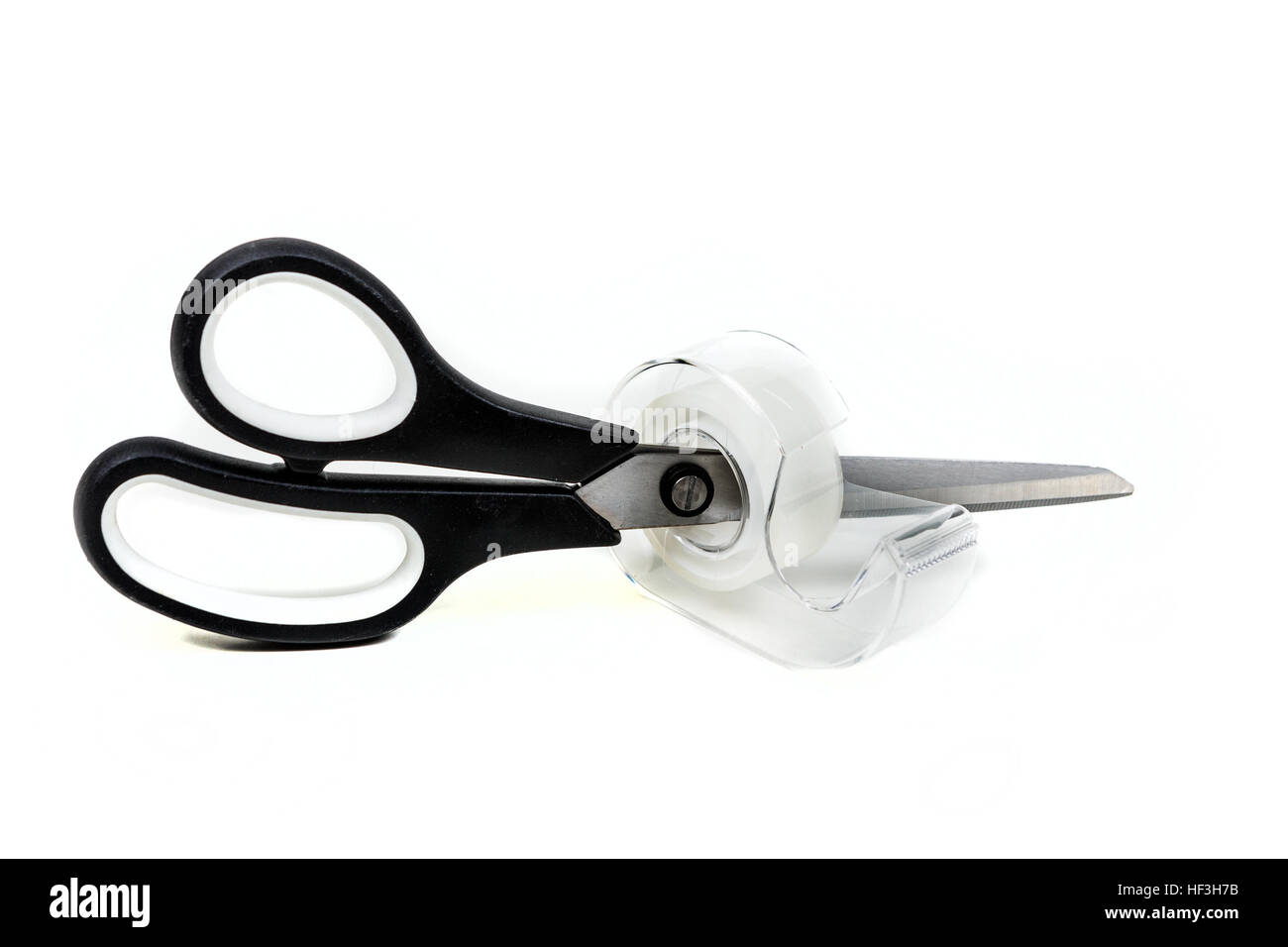 Scissors and clear tape isolated on white background Stock Photo - Alamy