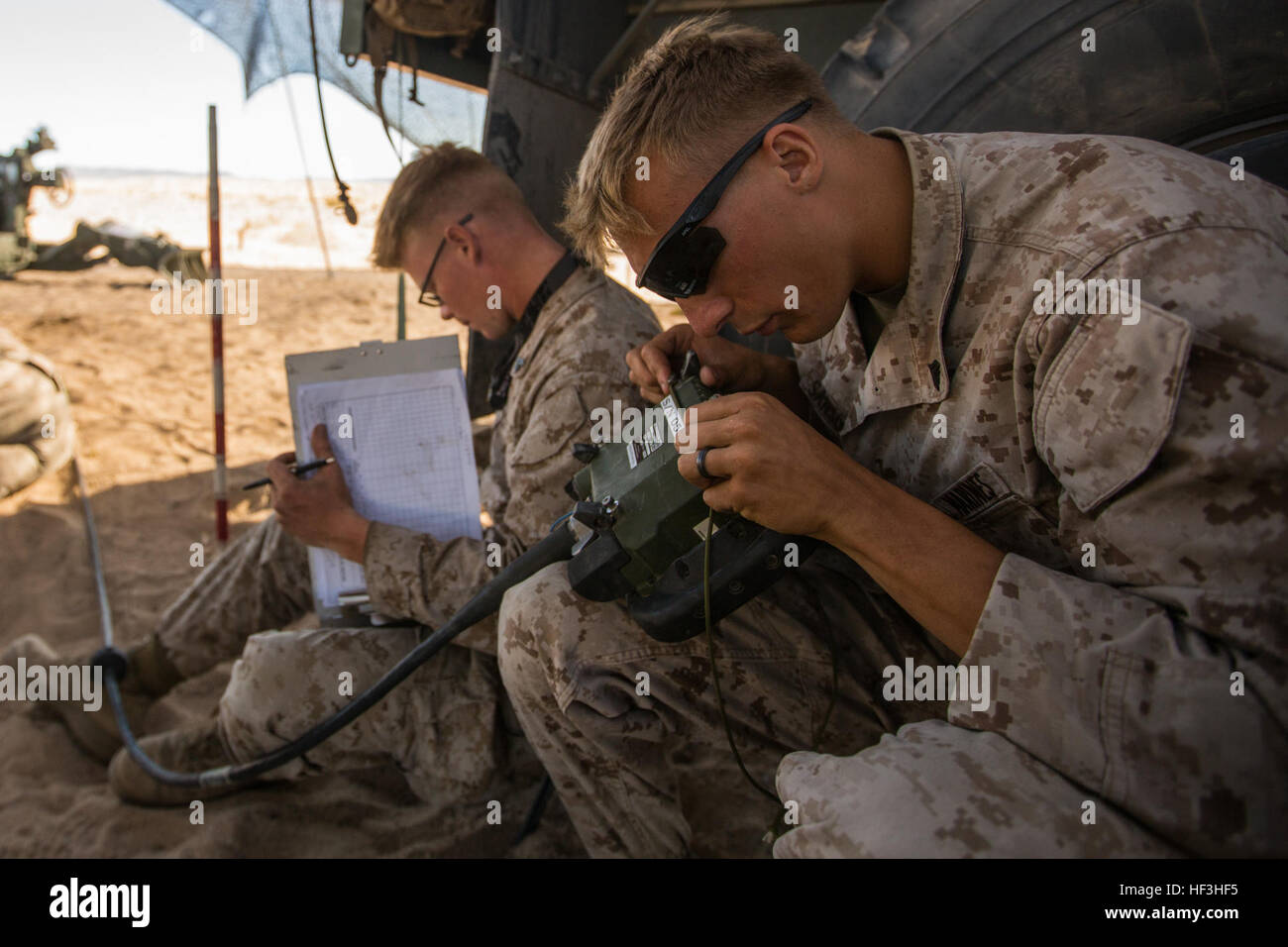 U.S. Marine Corps Cpl. James McCurdy, left, and Cpl. Tyler Sansonetti ...