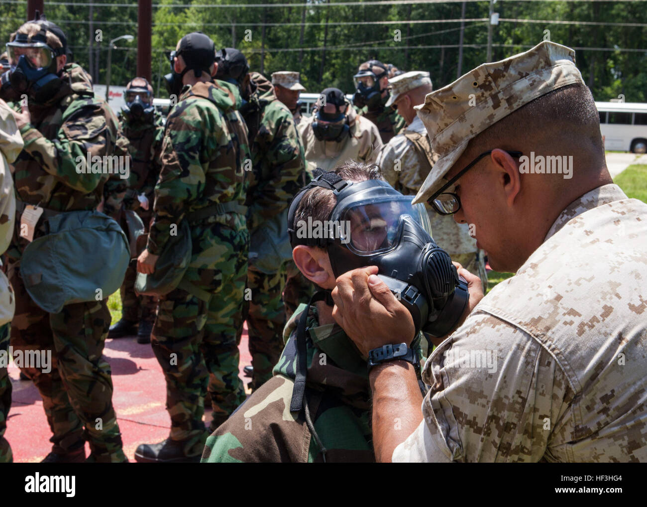 A Marine Corps CBRN specialist trains midshipmen at Camp Lejeune, North ...