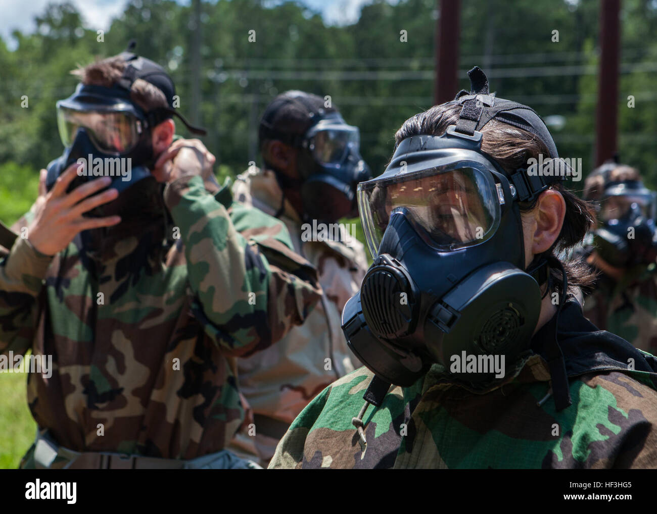 Midshipmen fit their M50 joint service general purpose mask prior to ...