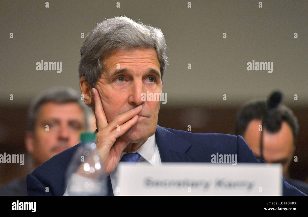 Secretary of State John Kerry looks on as Secretary of Defense Ash ...