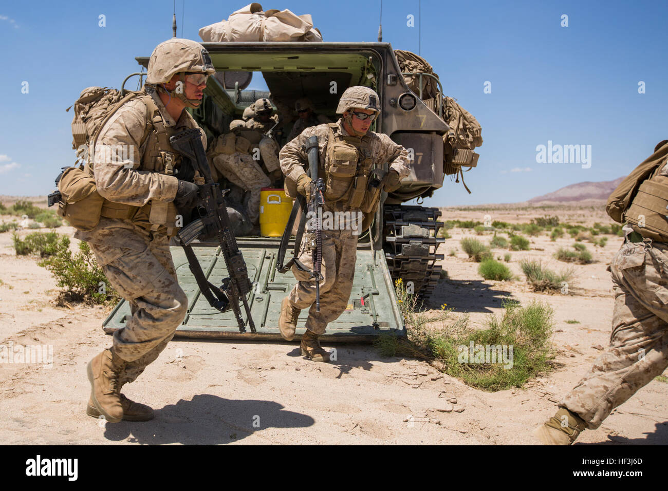 U.S. Marines with Company B, 1st Battalion, 3rd Marine Regiment, exit ...