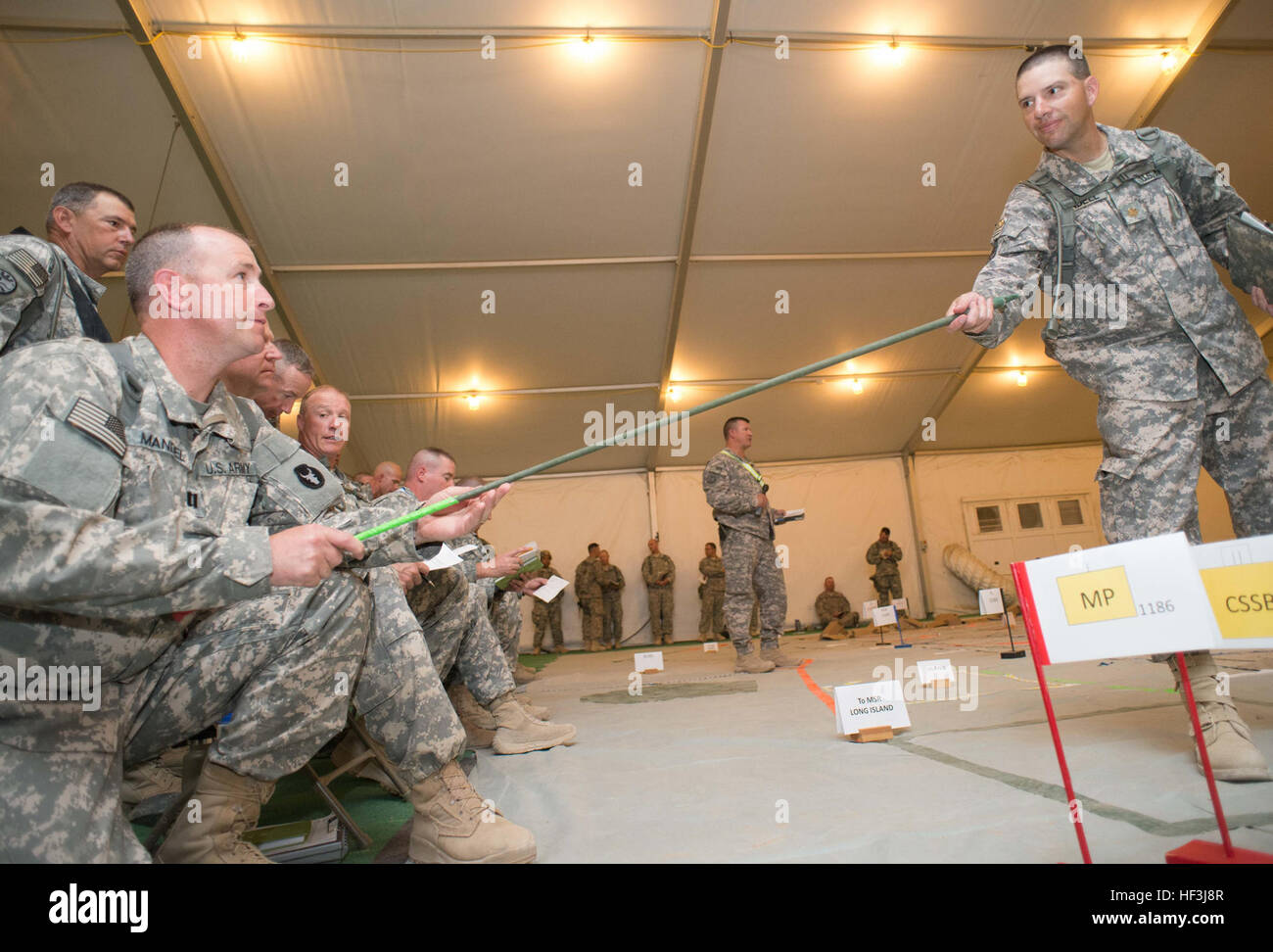 Idaho Army National Guard Capt. James Mandel (left), operations officer ...
