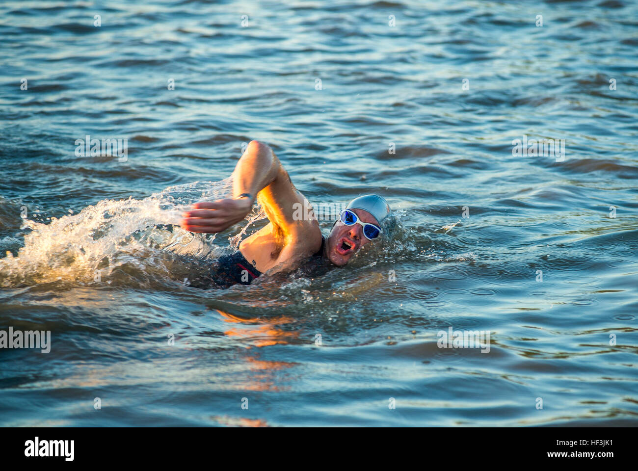Timothy Hough, from Fredericksburg Va., swims in the Potomac River for ...