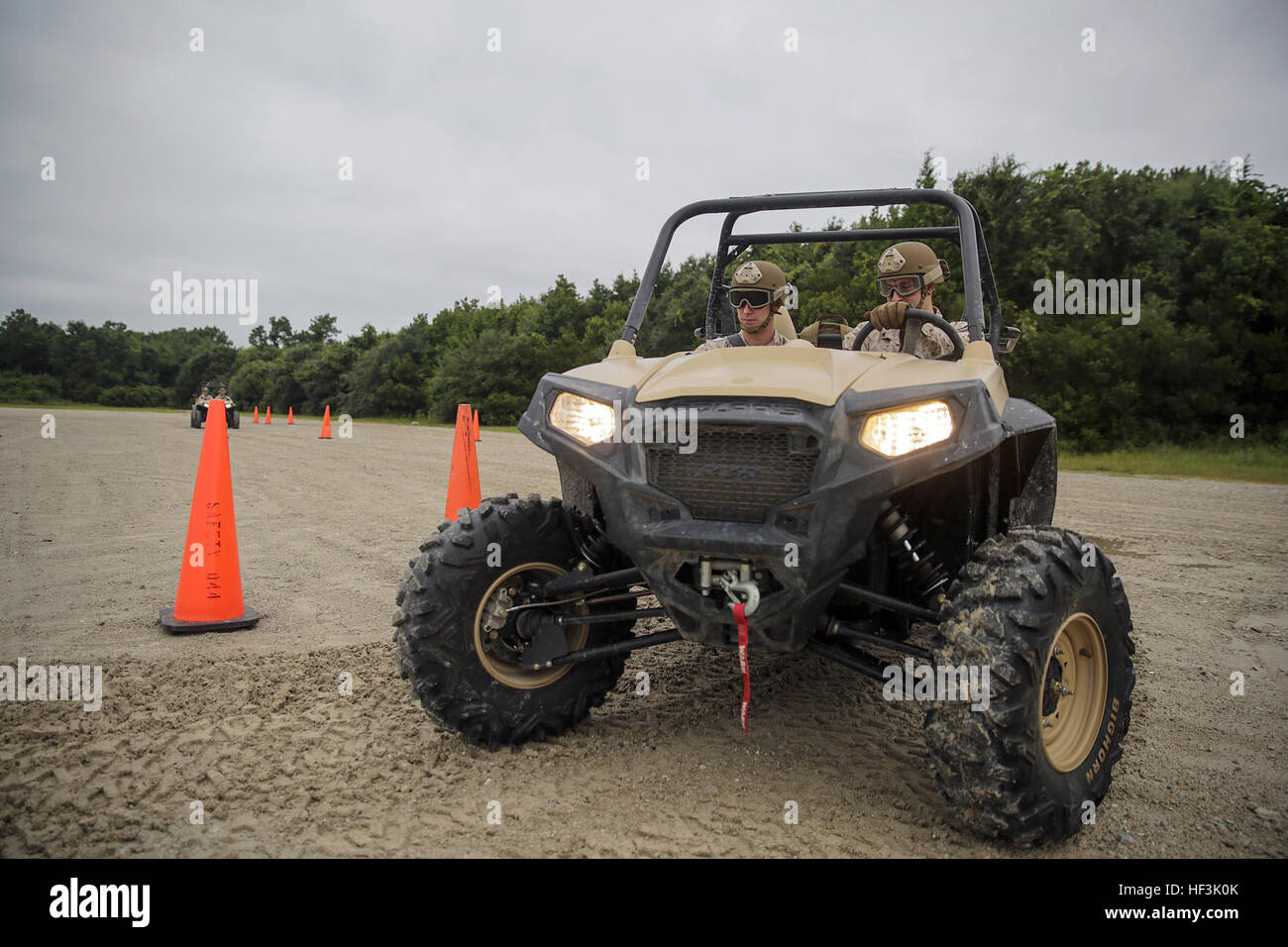 A Marine with Alpha Company, 2nd Reconnaissance Battalion drives a ...