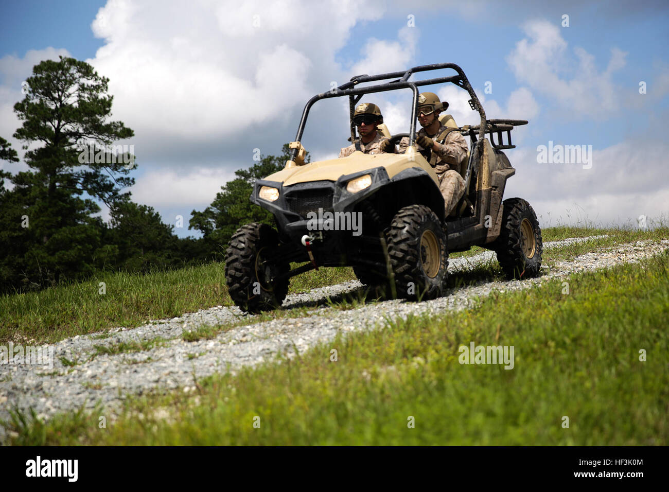 A Marine with Alpha Company, 2nd Reconnaissance Battalion drives a ...