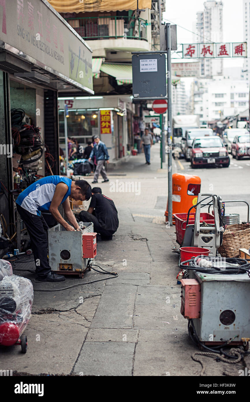 Hong Kong, China - November 12, 2014: Moving activity on busy street ...