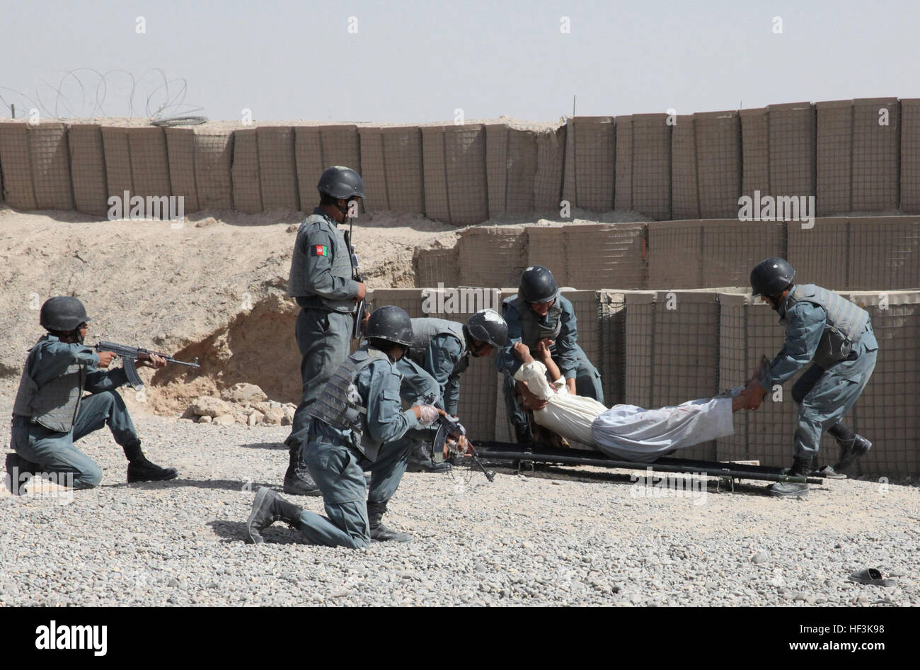 Members of the Afghan Uniformed Police conduct a simulated insurgent ...