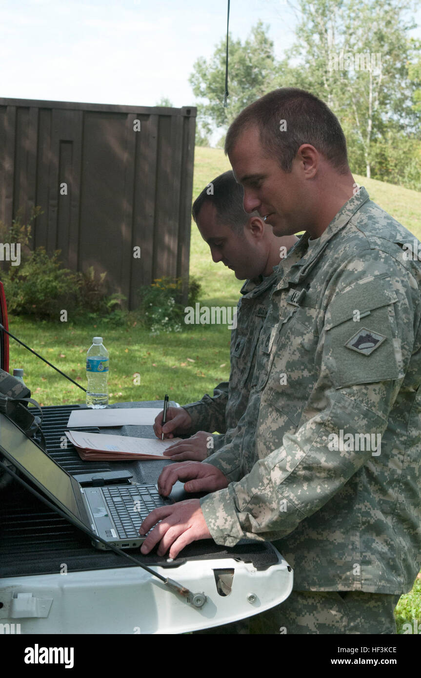 Staff Sgt. Bryan Donahue, and Staff Sgt. Ryan Rouleau, computer ...