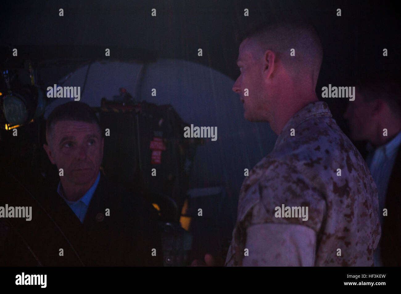 U.S. Marine Corps Lt. Col. Beaven, right, briefs U.S. Rep. Robert J ...