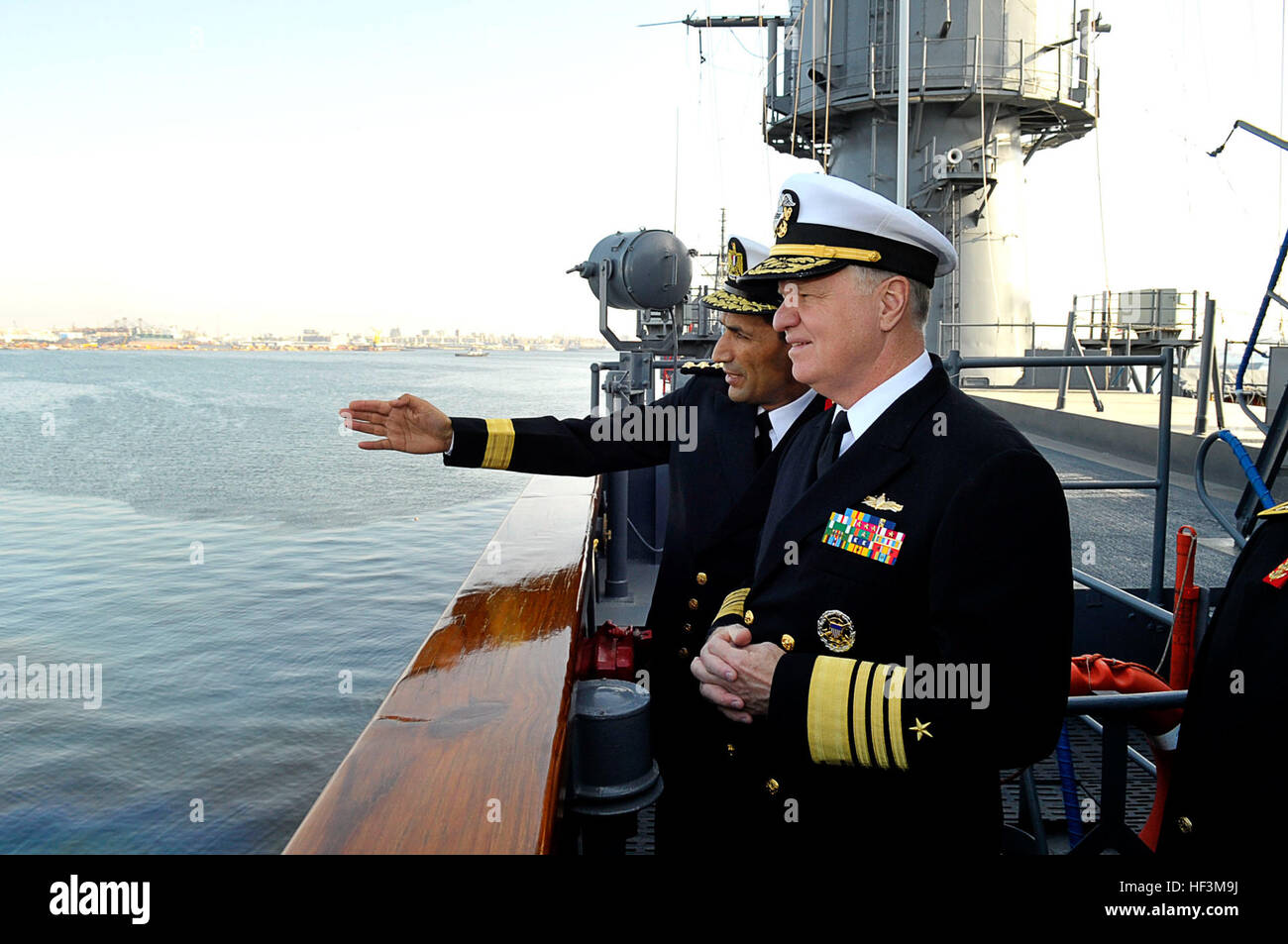 Chief of Naval Operations Adm. Gary Roughead, middle, speaks with the ...