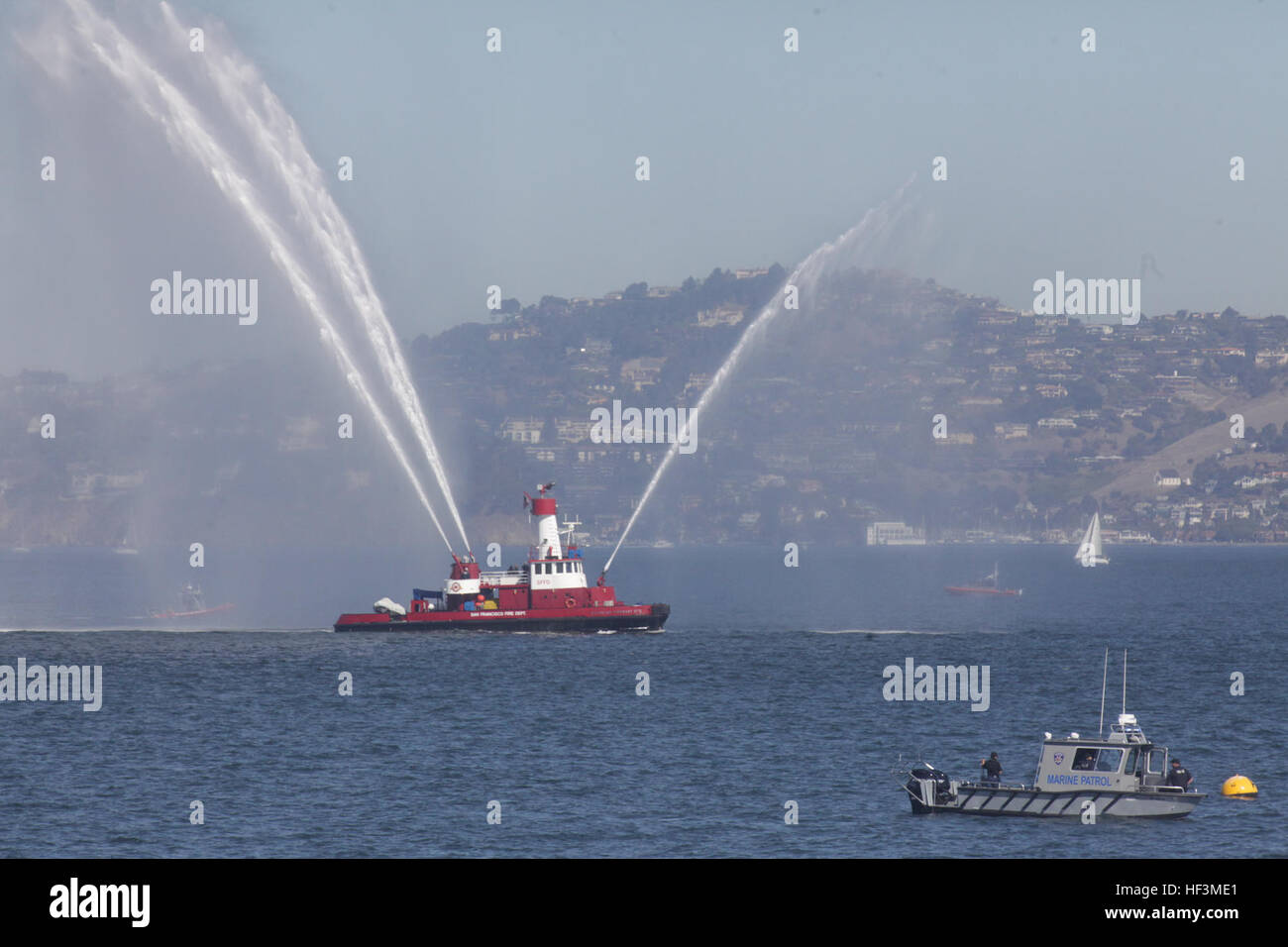 A firefighting ship passes through San Francisco Bay during the parade ...