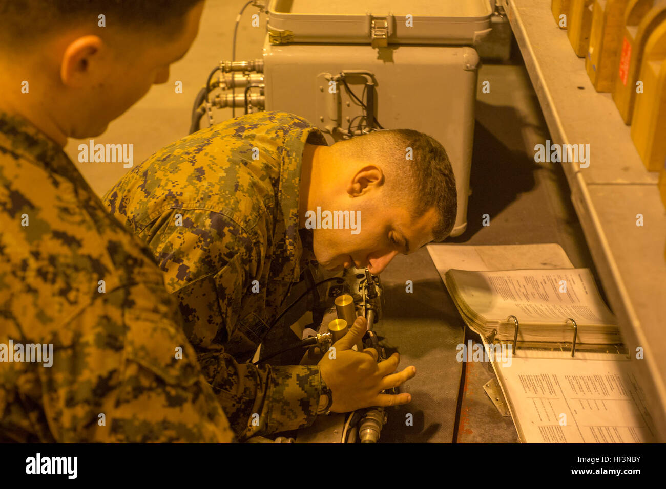 U.S. Marine Corps Cpl. Adam N. Tucker, left, and Sgt. Christopher M ...