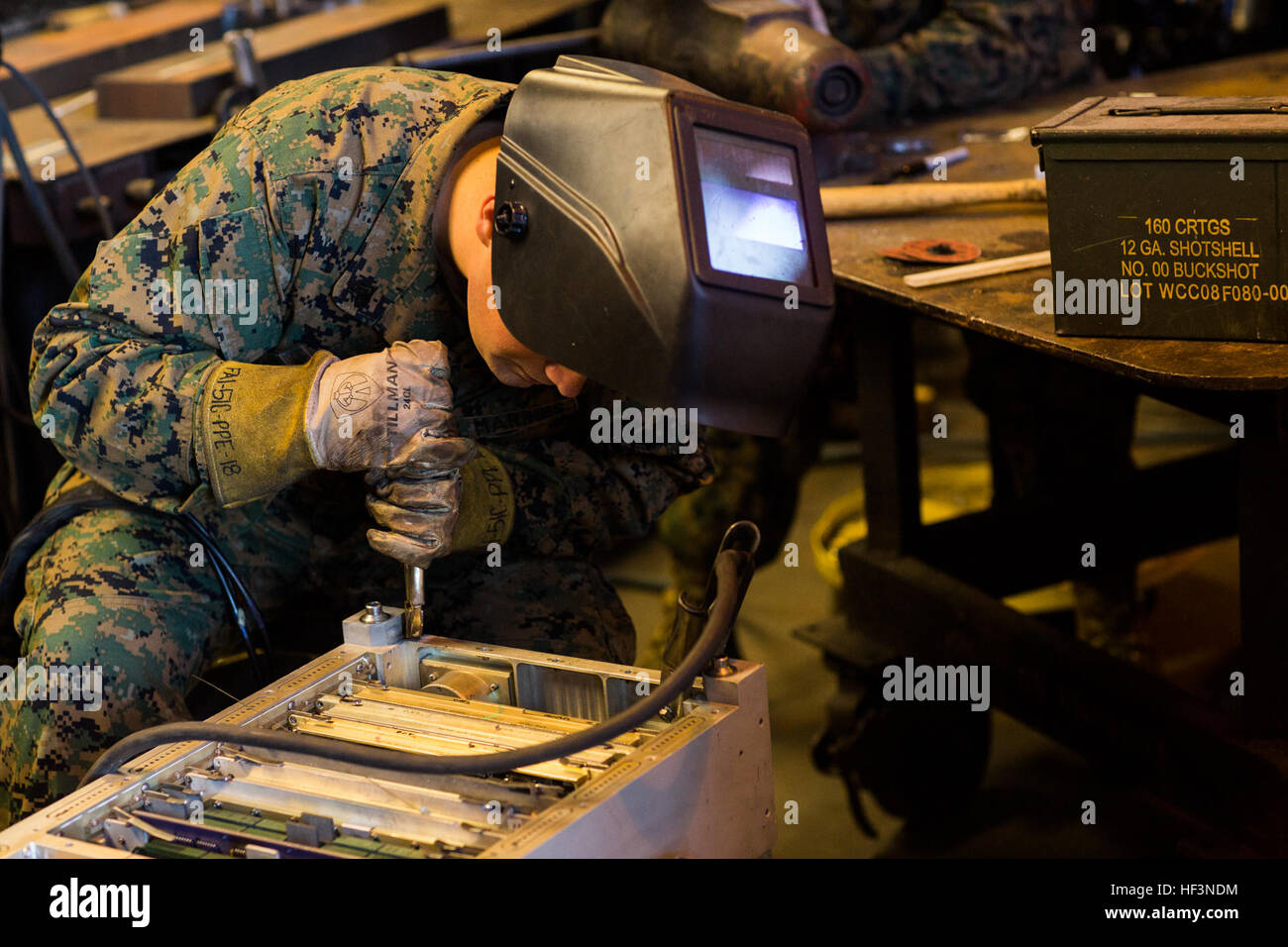 A Marine structural mechanic with Marine Aviation Logistics Squadron 14 ...