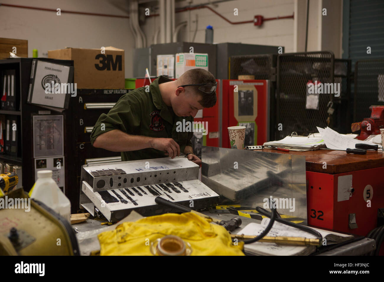 U.S. Marine Corps PFC. Timothy S. Adams, an airframe mechanic assigned ...