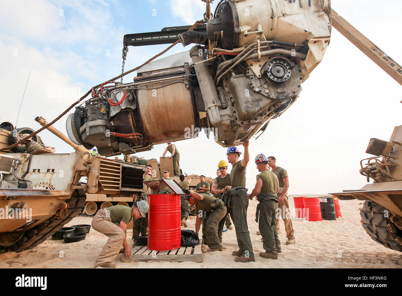 Tank crewman and mechanics with Tank Platoon, Battalion Landing Team 2/ ...