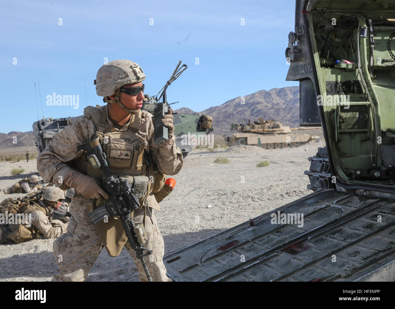 Cpl. Dustin Deloris relays orders over the radio during the mechanized ...