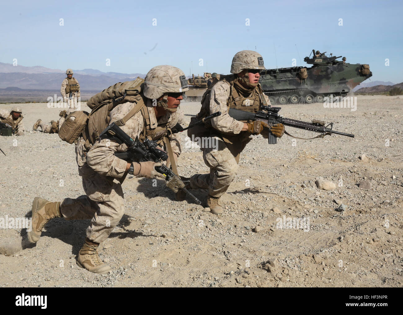 Marines rush a simulated combat town during the mechanized assault ...