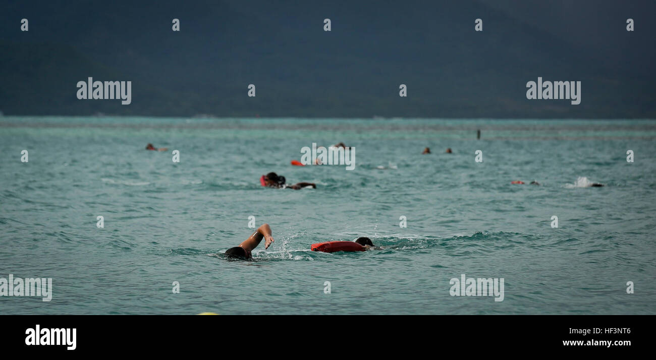 Students of Marine Corps Instructor Course of Water Survival swim to ...
