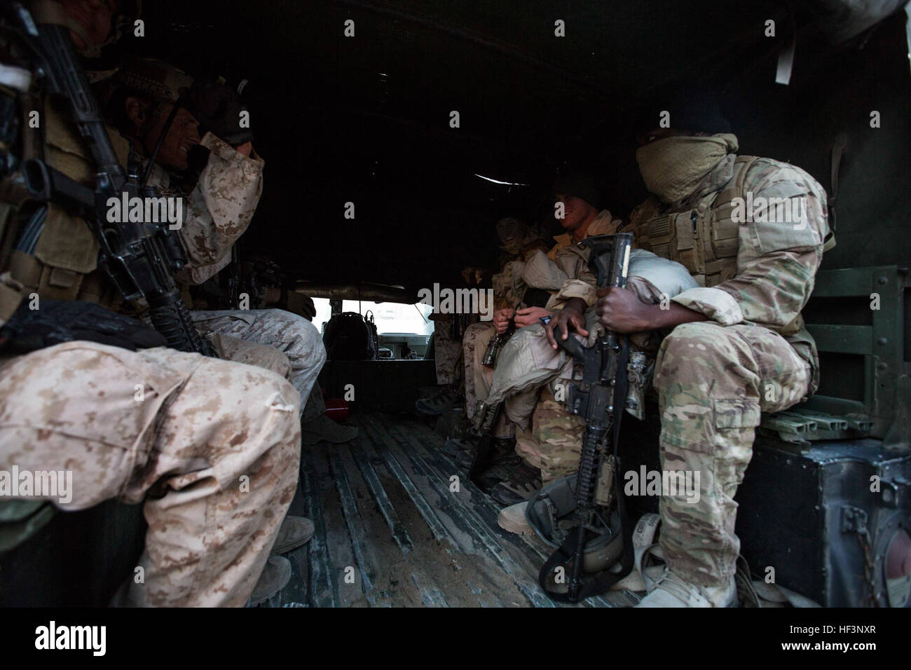 U.S. Marines with 1st Reconnaisance Battalion board a HUMVEE during ...