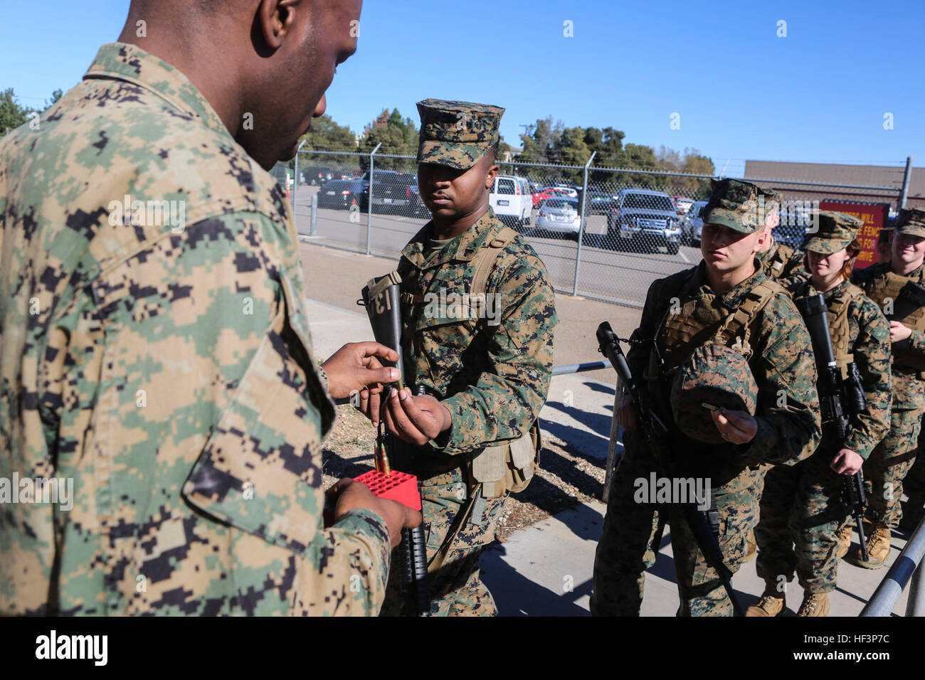 Service members with the Security Augmentation Force return ammunition ...