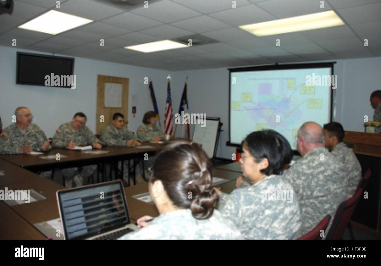 Members of the Texas State Guard brief command staff on the status of ...
