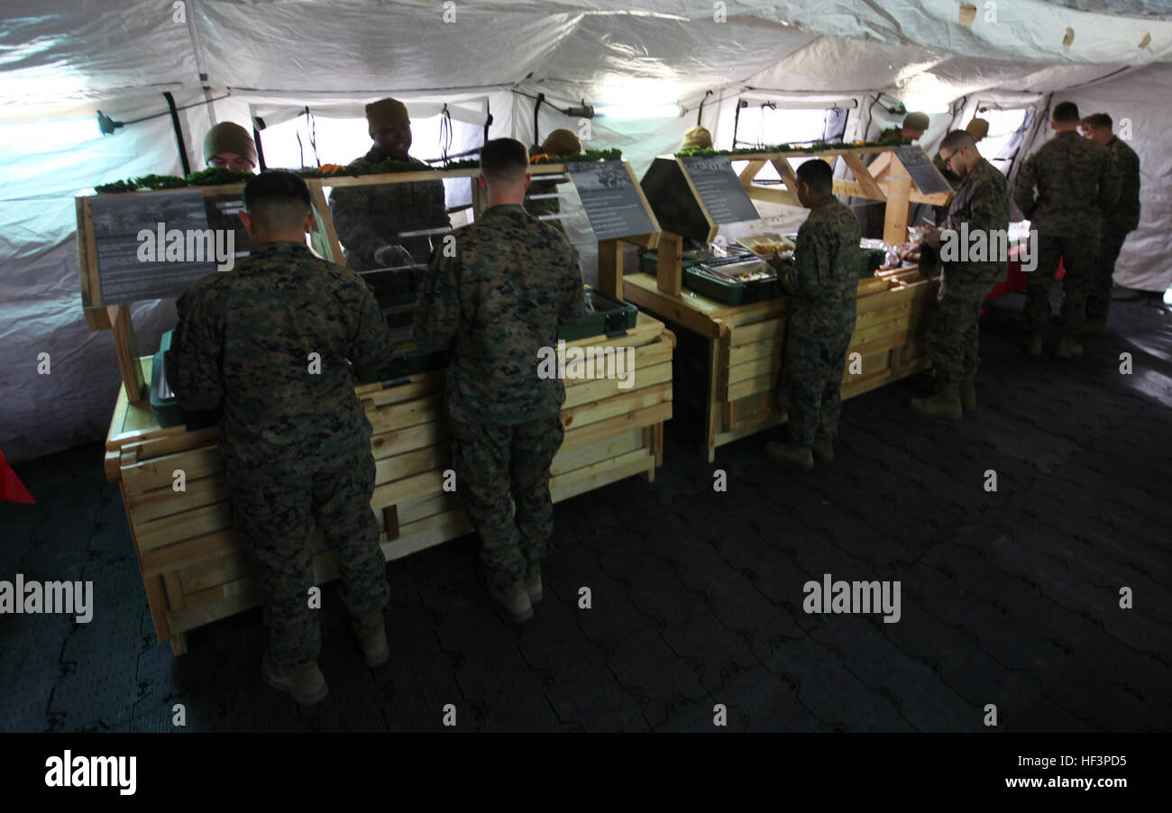 Food service specialists serve food to Marines at Marine Corps Air ...