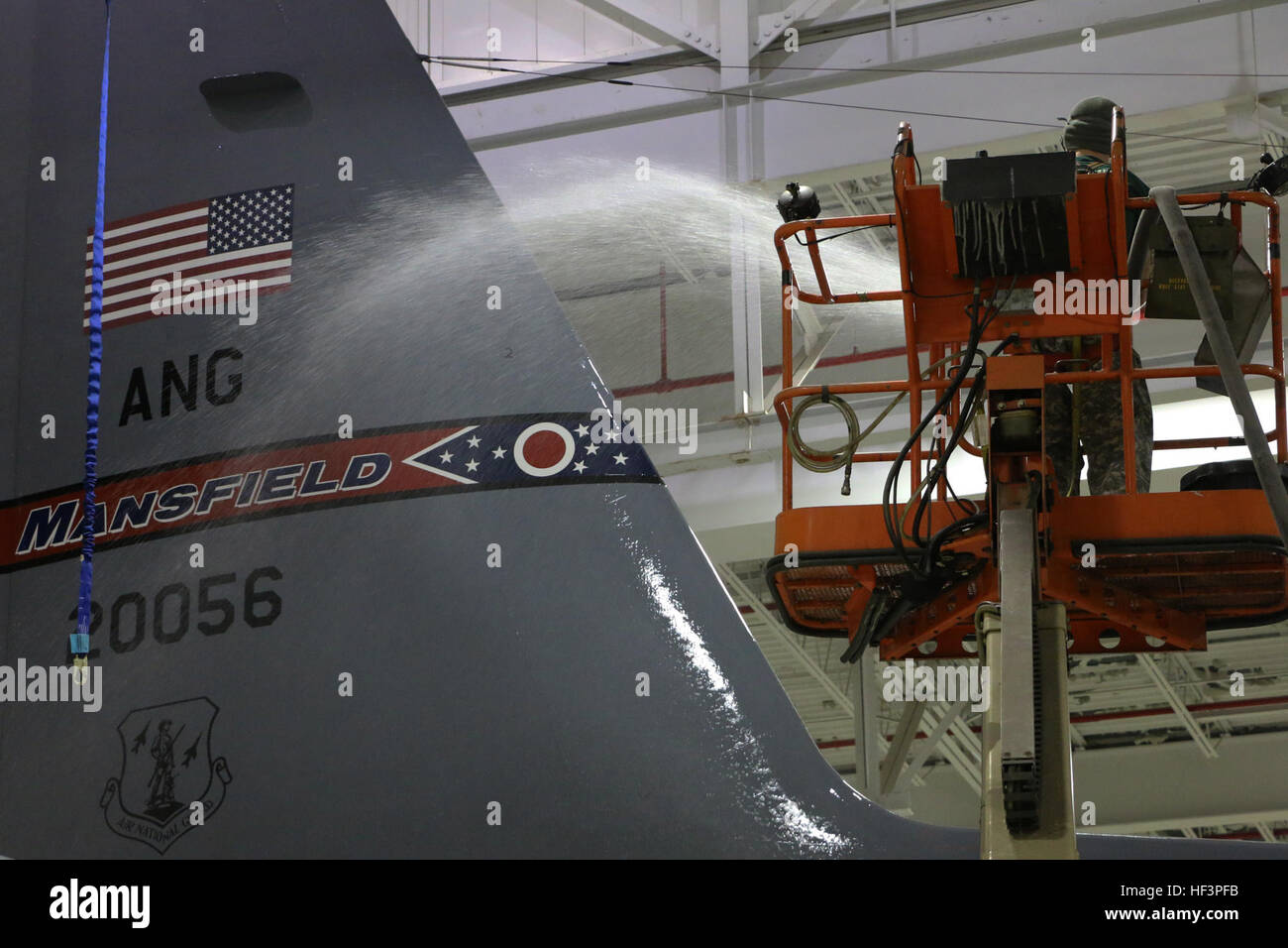Staff Sgt. Steven Harkins hand washes the C-130H Hercules at the 179th ...