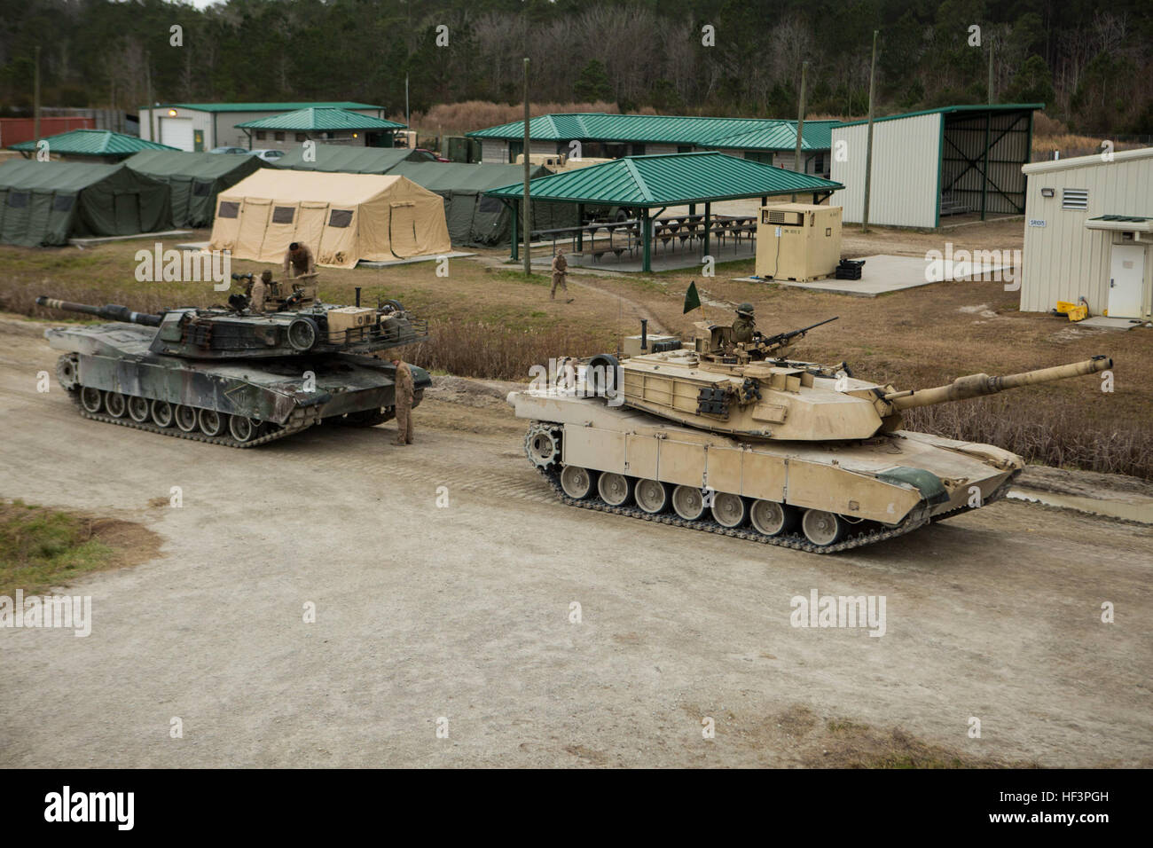 U.S. Marines with Company B, 2nd Tank Battalion, prepare their ...