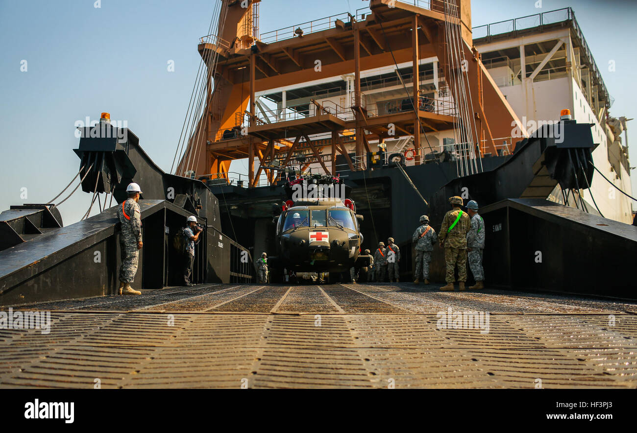 Royal Thai Navy and U.S. service members offload aircraft and ground ...