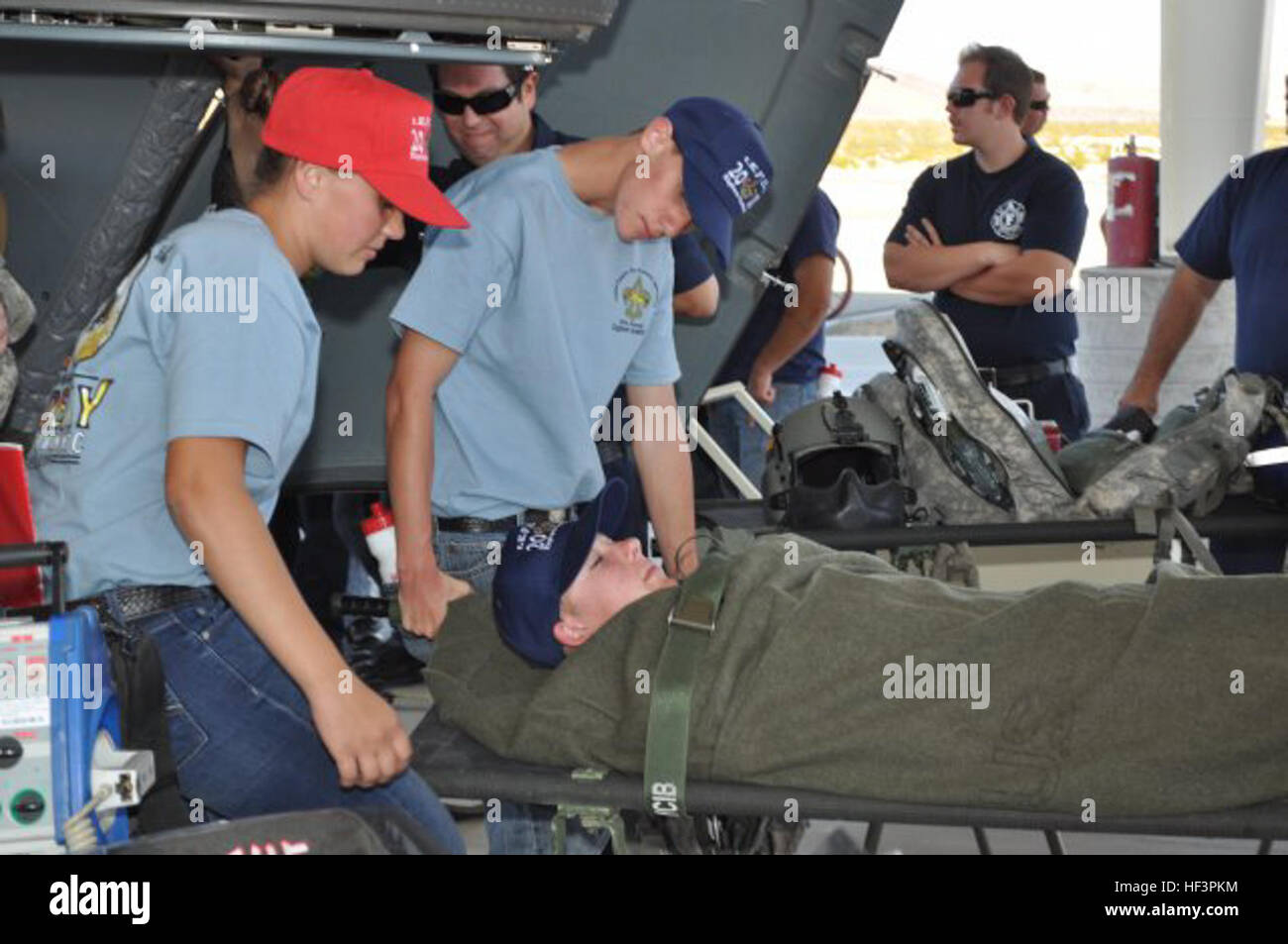 Fire explorers practice lifting a simulated casualty during emergency ...