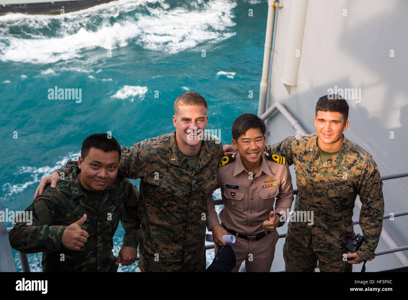 U.S. Marine Corps officers pose for a photo with members of the Royal ...