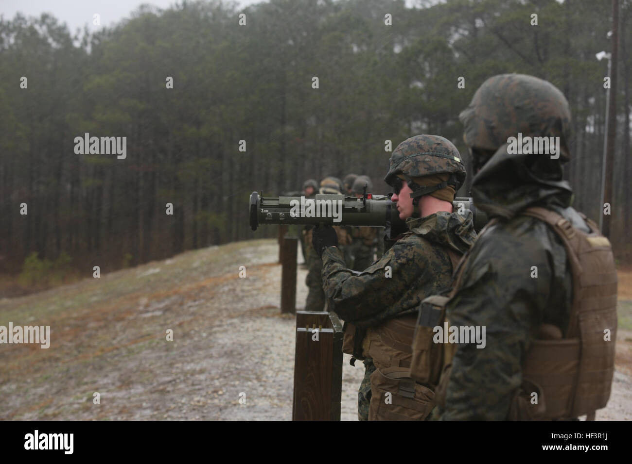 A U.S. Marine assigned to Marine Wing Support Squadron (MWSS) 271 fires ...