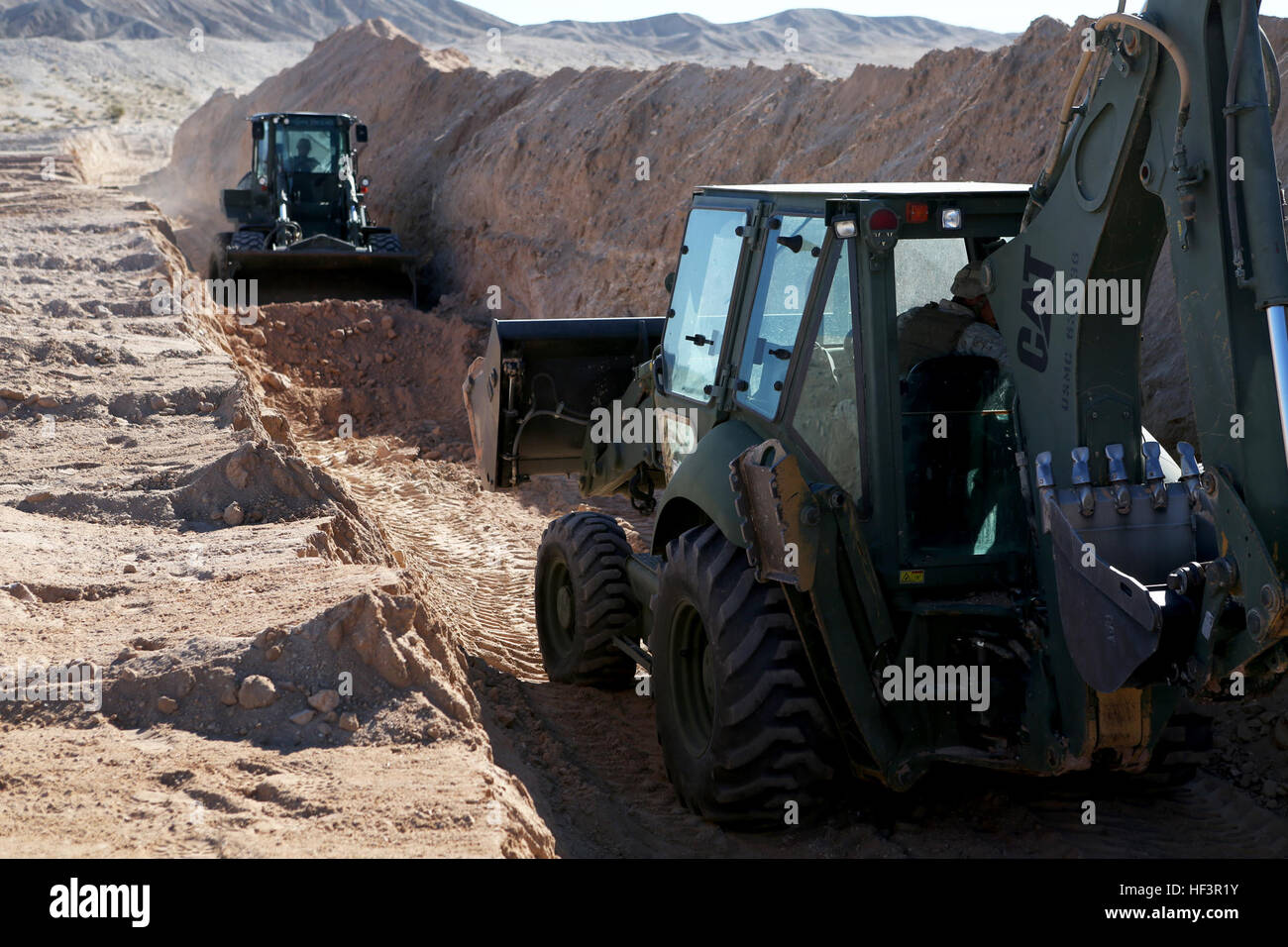 Heavy equipment operators with Headquarters and Support Company, Combat ...