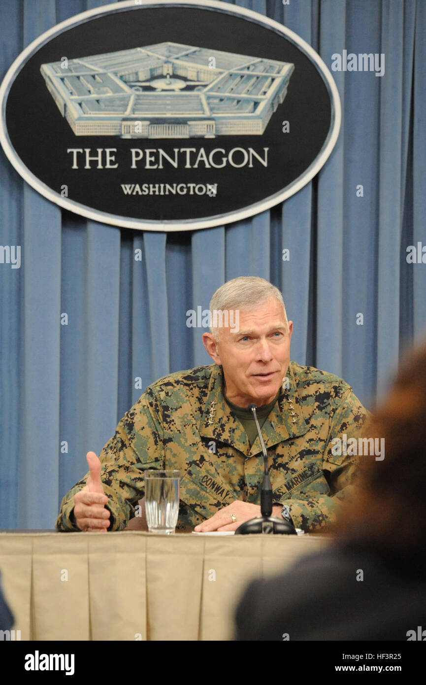 The Commandant of the Marine Corps, General James T. Conway, holds a ...