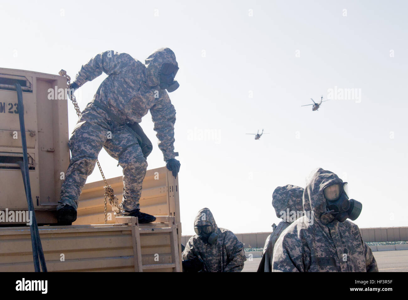 Army Reserve CBRN specialists conduct decontamination training on CH-47 ...