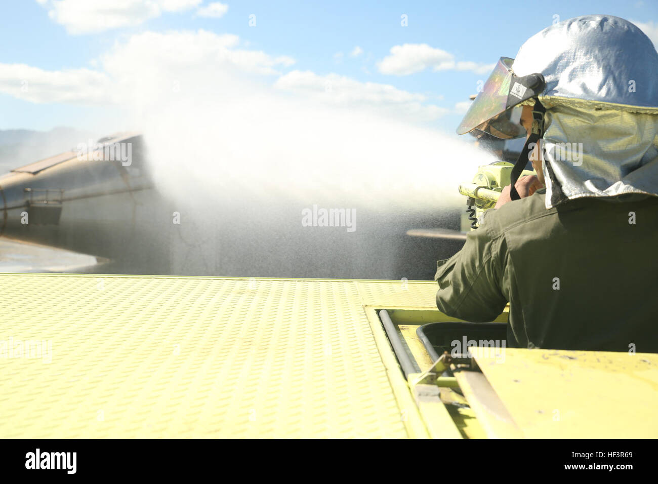 Pfc. Randy Gutierrez, an Air Rescue Fire Fighting turret operator with ...
