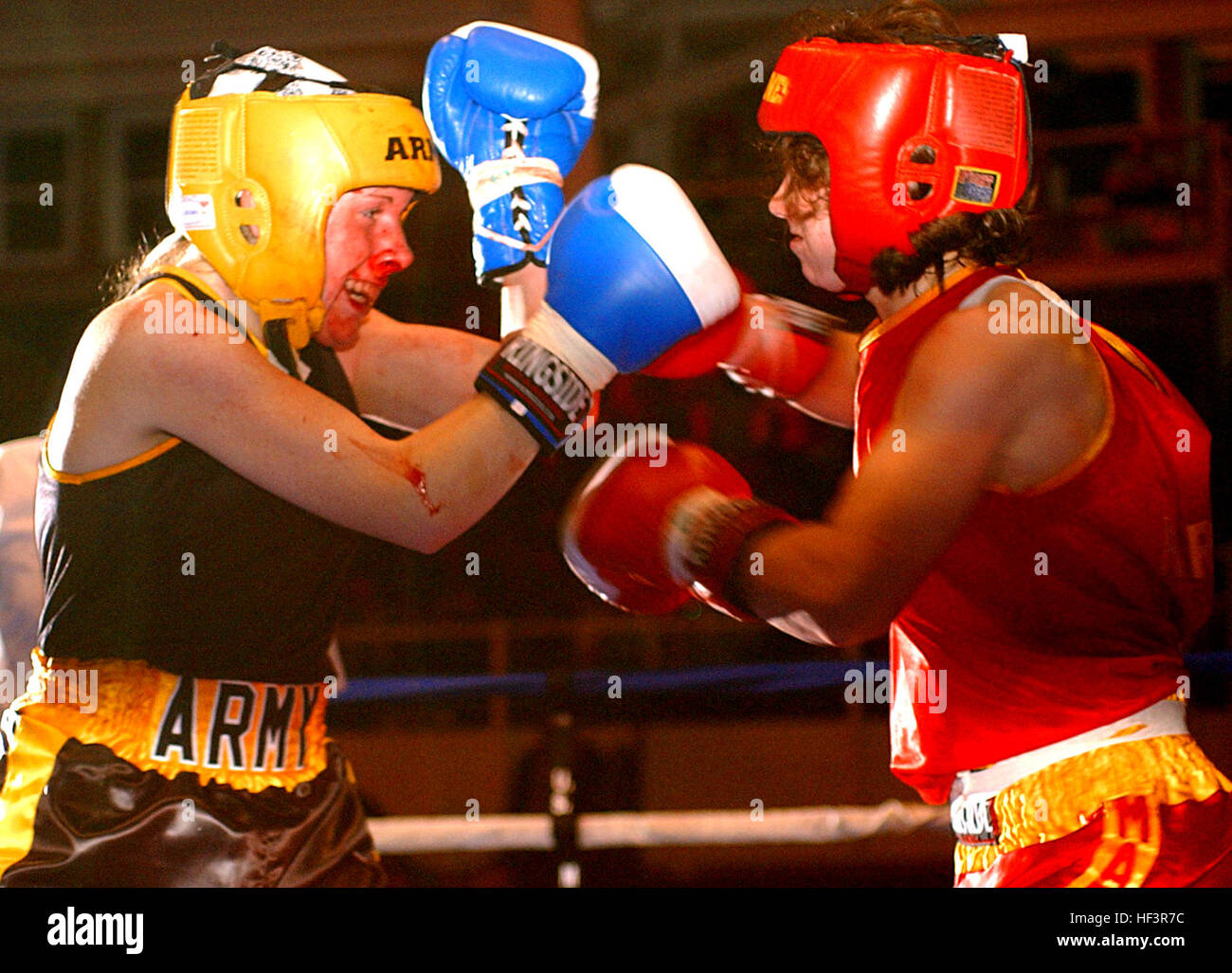 Cpl. Alisson Fasano swings a left hook at her opponent and makes boxing ...