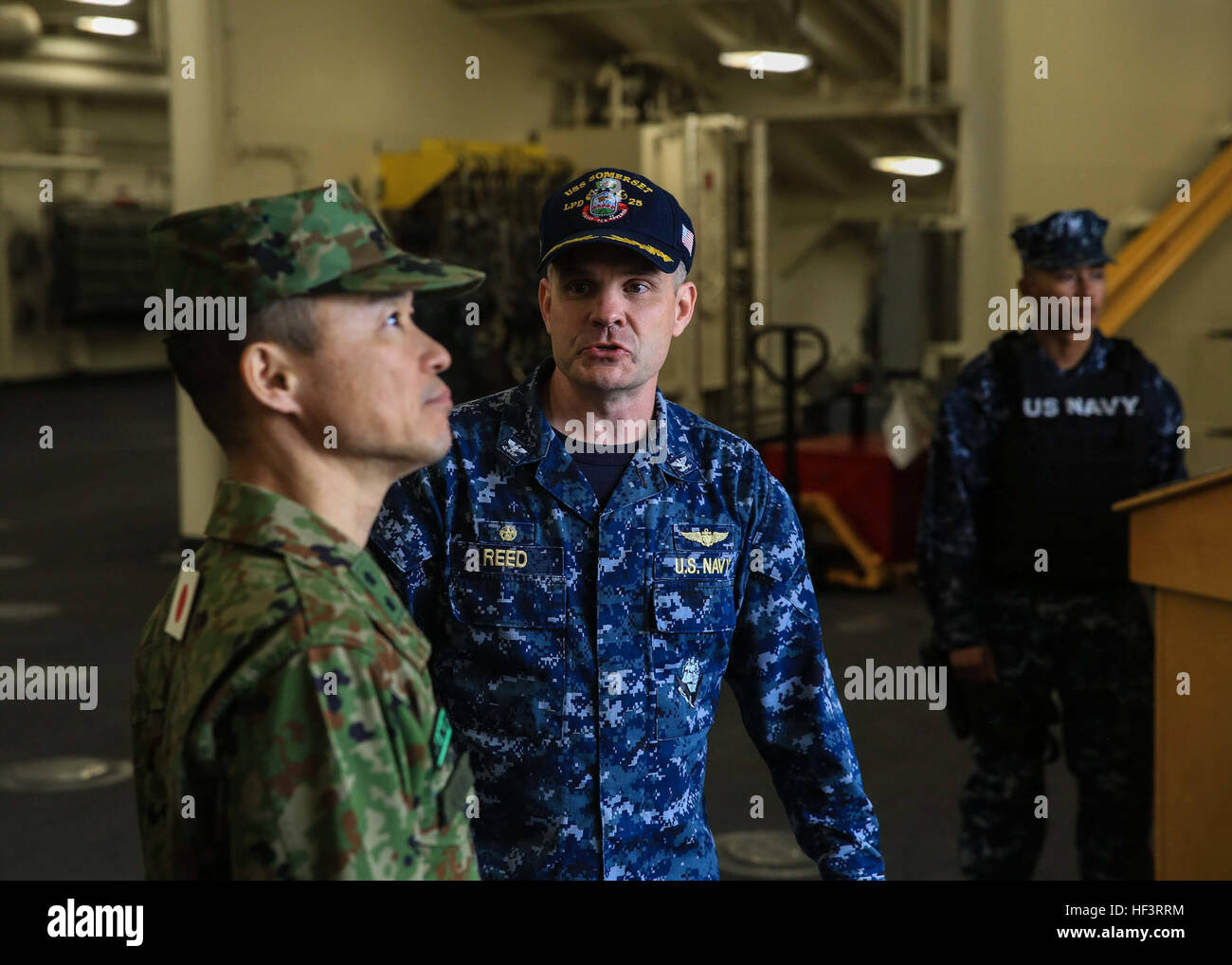 U.S. Navy Capt. Leonard E. Reed, commanding officer of the USS Somerset ...